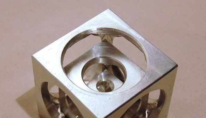Using only a lathe, metallurgic creates cube inside another cube Using only a lathe, metallurgic creates cube inside another cube